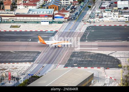 Gibraltar border entrance over airport runway Stock Photo - Alamy