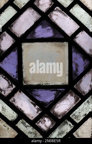 Geometric shapes of a beautiful medieval stained glass window in a ...