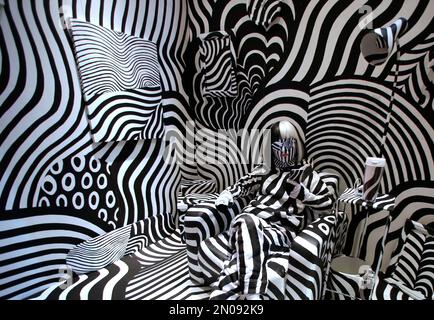 Model feebee poses as part of an art installation “Dazzle room” made by ...