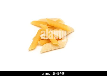 The comparison of the boiled and dry pasta. Different size and colors ...