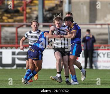 Wakefield, UK. 05th Feb, 2023. Tex Hoy #1 of Hull FC is tackled by ...