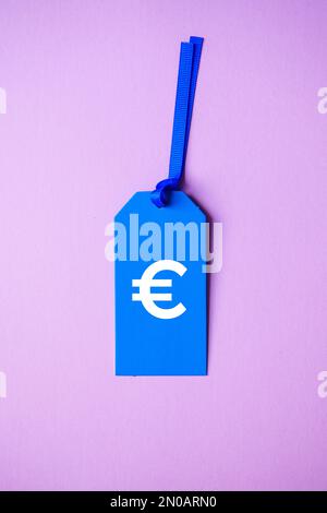 euro sign on the blue price tag for sales Stock Photo - Alamy