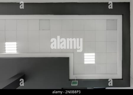 cassette stretched or suspended ceiling with square halogen spots lamps ...