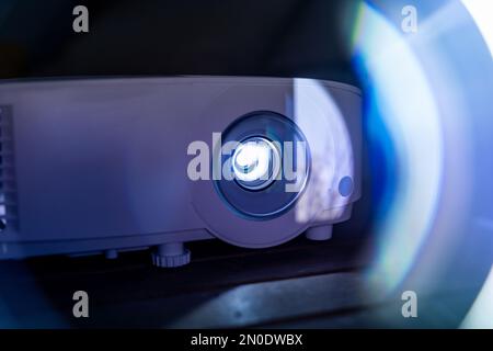 Home theater projector in the dark Stock Photo - Alamy