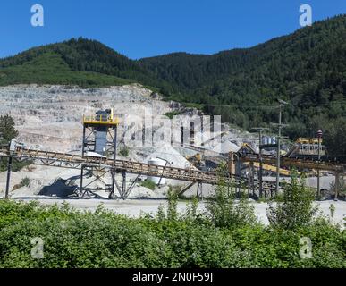 Rock stone crushing at quarry Stock Photo - Alamy