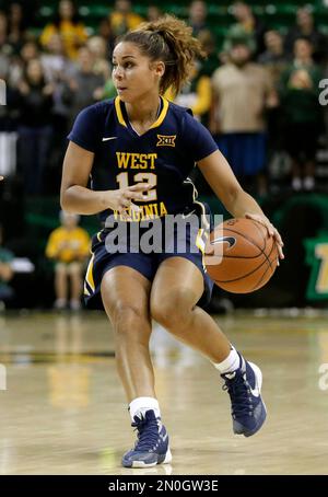 West Virginia guard Chania Ray (12) moves the ball against Baylor ...
