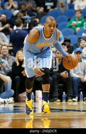 Denver Nuggets guard Randy Foye, right, drives on Indiana Pacers guard ...