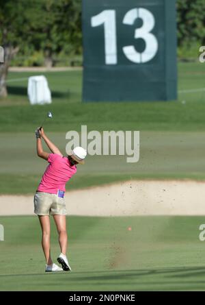 Jade Schaeffer of France strikes the ball at the 13th fairway during ...