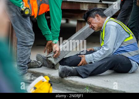 engineer has an accident where steel falls on his leg at work, causing ...