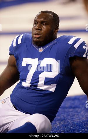 Indianapolis Colts center Jonotthan Harrison points out at the line of ...