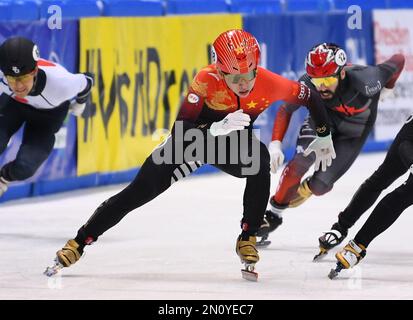 Dresden, Germany. 5th Feb, 2023. Lin Xiaojun (L) of China competes ...