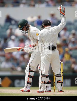 Australia's Mitchell Marsh, left, appeals for the wicket of South ...