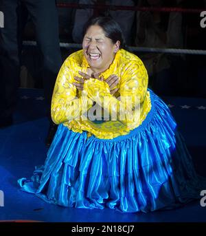 Yenny Mamani ‘Marta la Altena,’ right, is declared the winner after her ...