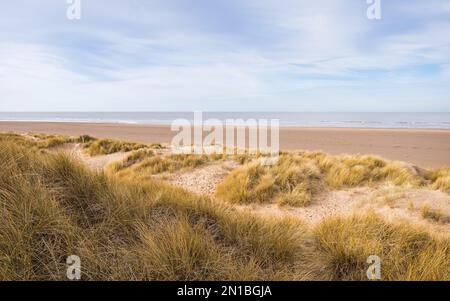 Ainsdale beach pictured over the marram grass topped sand dunes on the ...