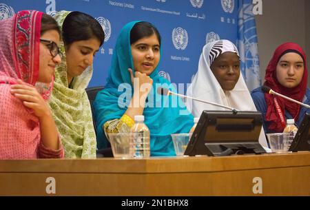 Malala Yousafzai, center, with friends Amina Yusuf, left, and Kainat ...