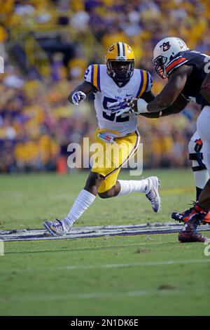 LSU linebacker Kendell Beckwith (52) tackles Mississippi running back ...