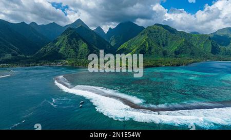 Aerial of Teahupoo wave and Tahiti Iti, Society Islands, French ...