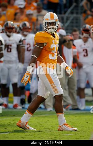 Tennessee defensive back Brian Randolph is interviewed by reporters ...