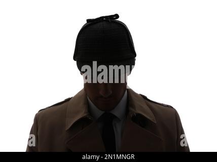 Old fashioned detective in hat on white background Stock Photo - Alamy