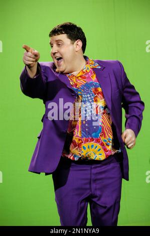 Peter Kay dressed in the famous purple suit for the 2005 Amarillo Comic ...
