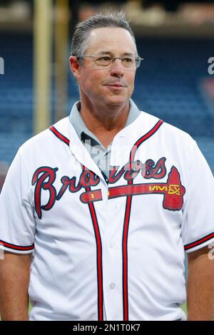 Atlanta Braves pitcher Greg Maddux pitches during a game. Circa Braves ...