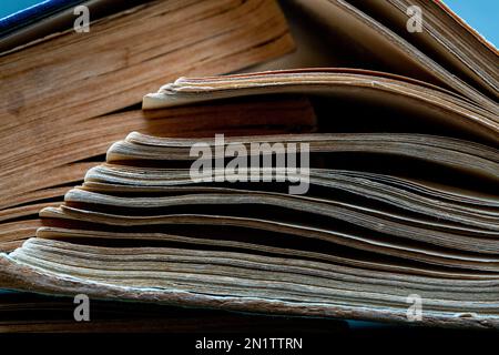 Two old books bound together in close-up on the table Stock Photo - Alamy