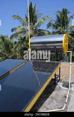 INDIA, Karnataka, Mudbidri, sun collector for warm water on farm house ...
