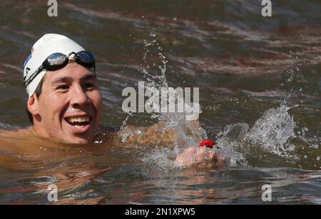 South Africa's Chad Ho celebrates winning the gold medal after ...