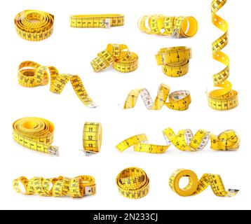 Set of yellow measuring tapes on white background Stock Photo - Alamy