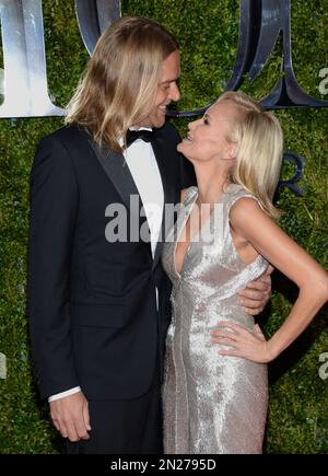 Andrew Pruett, left, and Kristin Chenoweth arrive at the 69th annual ...