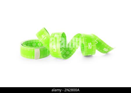 New green measuring tape isolated on white Stock Photo - Alamy