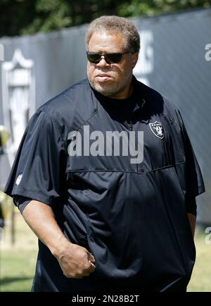 Oakland Raiders general manager Reggie McKenzie stands on the field ...