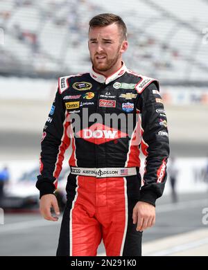 Austin Dillon walks on pit road before qualifying for Sunday's NASCAR ...