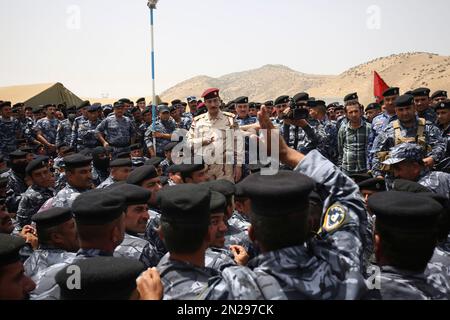 Members of local, state and military police riot training at Camp ...