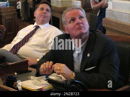Kansas state Reps. John Whitmer, left, R-Wichita, and Marc Rhoades ...