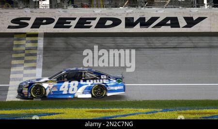 Driver Jimmie Johnson (48) crosses the start-finish line during a ...