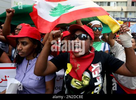 Domestic workers chant slogans during a protest held by Stop Violence ...