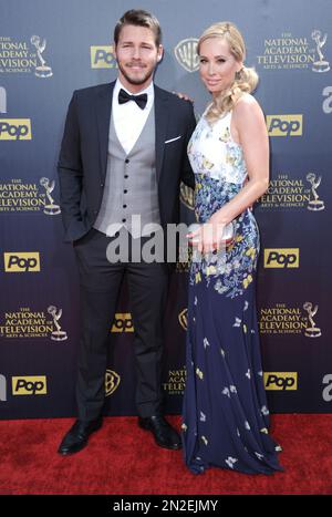 Scott Clifton, left, and Nicole Lampson arrive at the 42nd annual ...