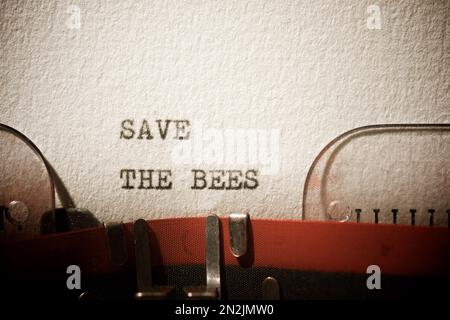 Save the bees text written with a typewriter Stock Photo - Alamy