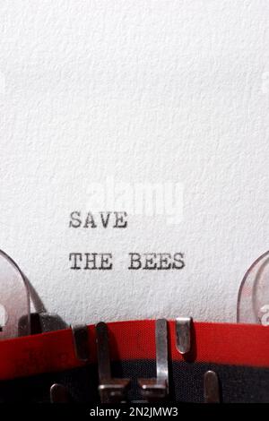 Save the bees text written with a typewriter Stock Photo - Alamy