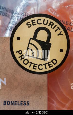 Security protected label sticker on packet of salmon from M&S Stock ...