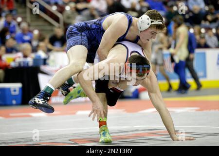 South Park's Jake Wentzel, top, grapples with Pius X's Michael Comunale ...