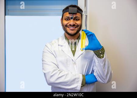 ENT doctor holding a big syringe for nose washing Stock Photo - Alamy
