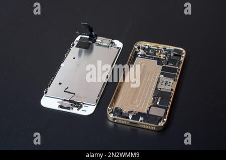 The internals and components of a disassembled smartphone Stock Photo ...