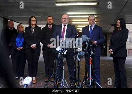 Metropolitan Police DCI lain Moor (left) listens as Peter Burt (centre ...