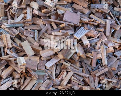 Pattern formed by a heap of sawn wood and chopping remains for use as ...