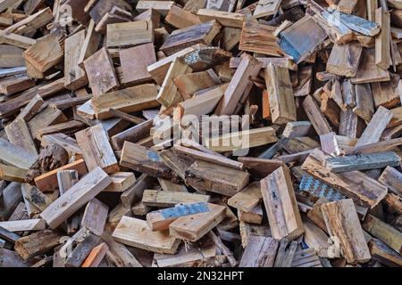 Pattern formed by a heap of sawn wood and chopping remains for use as ...