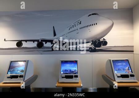 Delta Airlines self-service check-in kiosks at the International ...