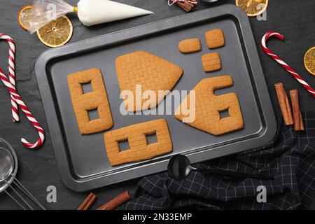 Gingerbread house parts and decorations on a gray background Stock ...