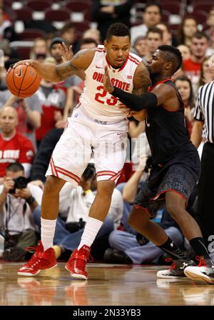 Ohio State's Amir Williams, left, works for a rebound against Morgan ...